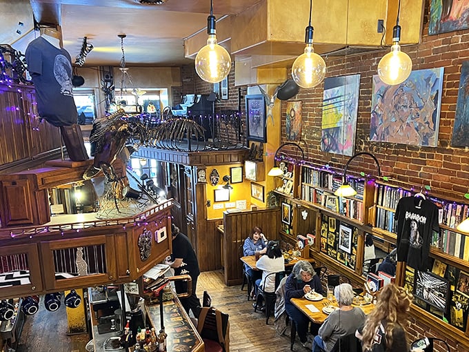 From this bird's-eye view, the caf&eacute; reveals its true character &ndash; part library, part eatery, all charm. Those Edison bulbs aren't just lighting; they're atmosphere makers!