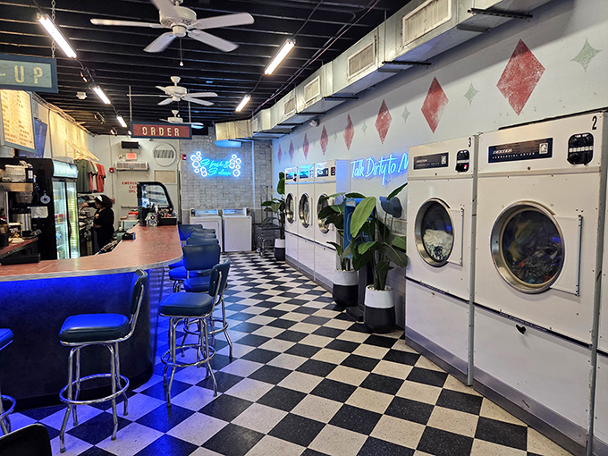 Black and white checkered floors meet vintage washing machines in this whimsical caf&eacute; where the spin cycle involves Cuban coffee rather than your dirty socks.