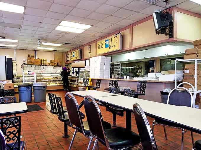 The no-nonsense interior says it all: here, it's about the donuts, not the décor. Priorities perfectly aligned!
