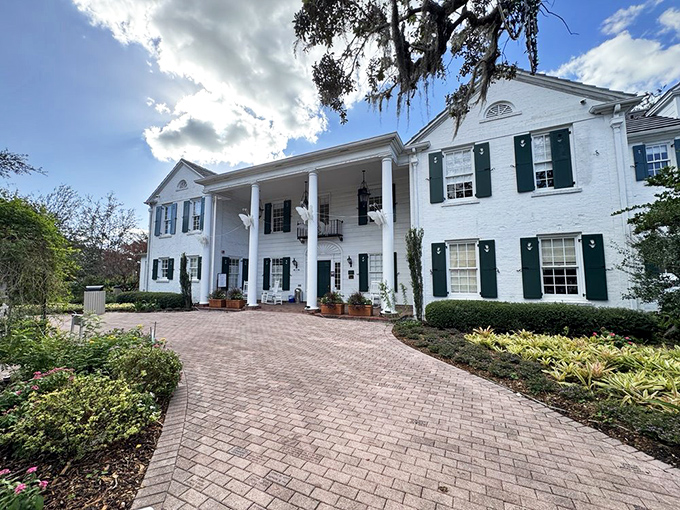 The historic Selby House stands proudly in pristine white, like a Southern belle dressed for the most elegant garden party.