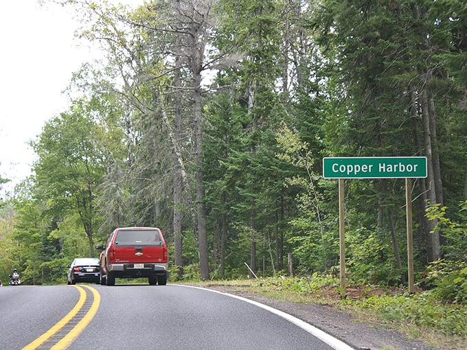 The road to relaxation begins here &ndash; Copper Harbor's welcome sign marks the transition from everyday life to wilderness escape.
