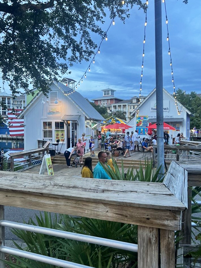 Twilight transforms the village into a twinkling wonderland, where string lights create the perfect backdrop for that vacation memory you'll reminisce about in February.