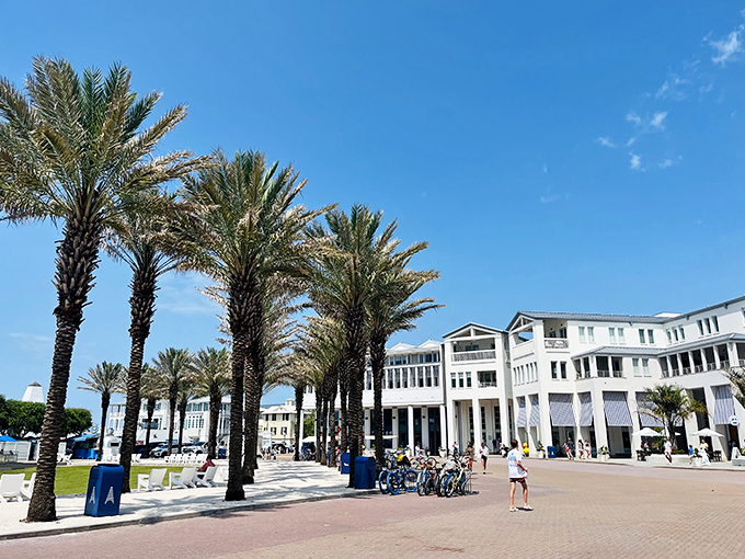 The town center buzzes with life as palm trees stand at attention, creating the perfect backdrop for your "I'm living better than you" vacation photos.