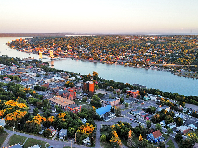A bird's-eye view of Hancock reveals its perfect positioning along the waterfront, autumn colors painting the landscape.