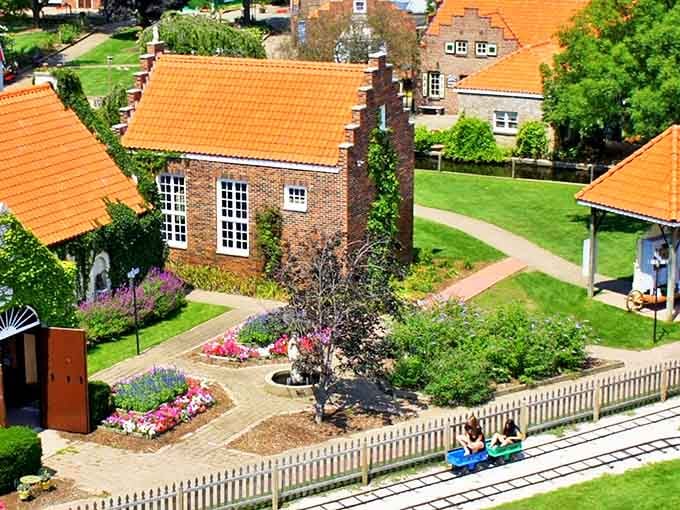 Aerial view of Dutch Village's charming buildings and meticulous landscaping – like someone shrunk Amsterdam and planted it in Michigan's backyard.