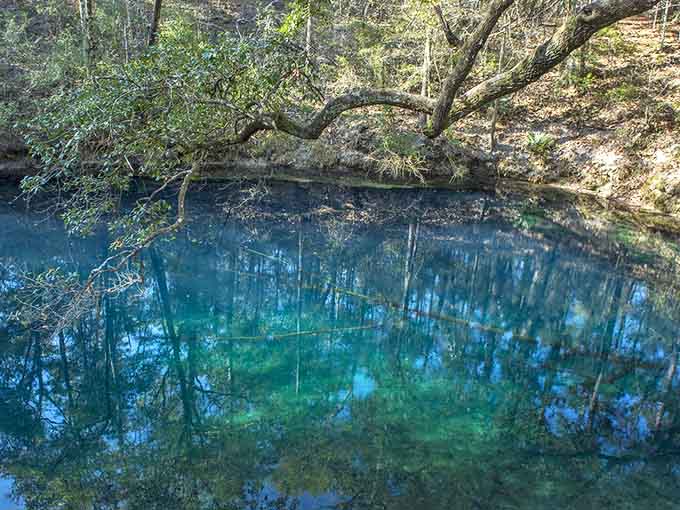 Crystal-clear blue waters invite reflection&mdash;both the mirror kind and the philosophical sort that comes when facing such pristine beauty.