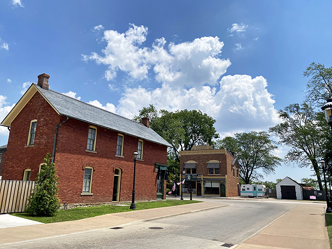 Brick buildings and wooden storefronts create an authentic streetscape where modern life fades away and historical America emerges in vivid detail.