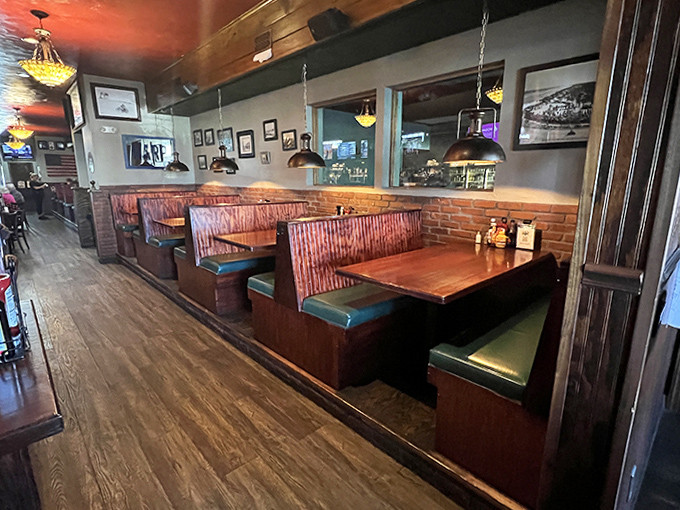 Wooden booths with comfy green upholstery invite you to settle in and stay awhile &ndash; this isn't fast food, it's food worth savoring.