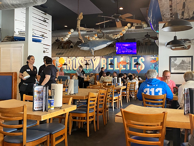 Inside Rusty Bellies, nautical charm meets serious seafood business with fishing memorabilia that tells the story of your dinner's journey from Gulf to plate.