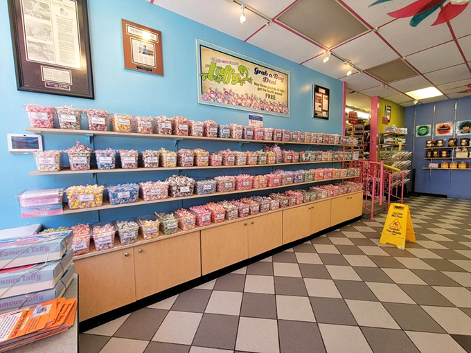 Rows upon colorful rows of taffy containers create a candy rainbow effect that makes choosing just one flavor mathematically impossible.