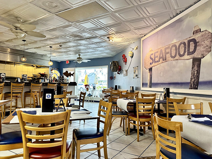 Blue walls and white tin ceilings create the perfect backdrop for seafood magic – no designer "beach theme" here, just authentic coastal atmosphere.