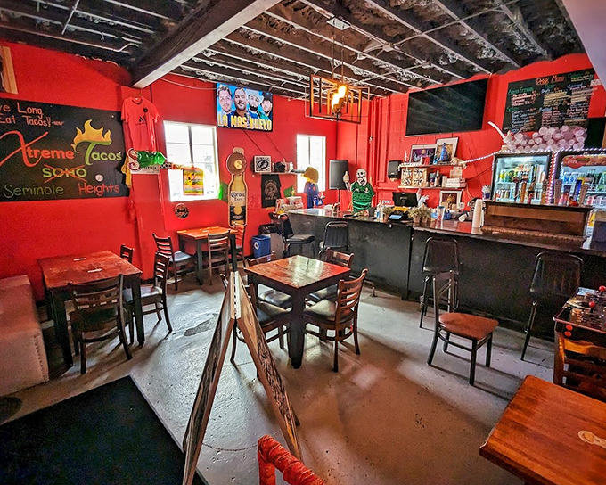Vibrant red walls and exposed ceiling create a no-frills atmosphere where the food, not the decor, takes center stage in this cozy taqueria.