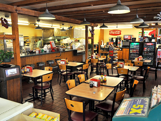 Simple wooden tables and chairs create the perfect no-nonsense setting for some serious eating business.
