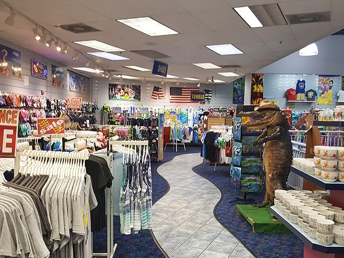 Interior view: Step inside and witness retail paradise &ndash; where blue wave-patterned carpeting guides shoppers through a sea of Disney treasures and Florida souvenirs.