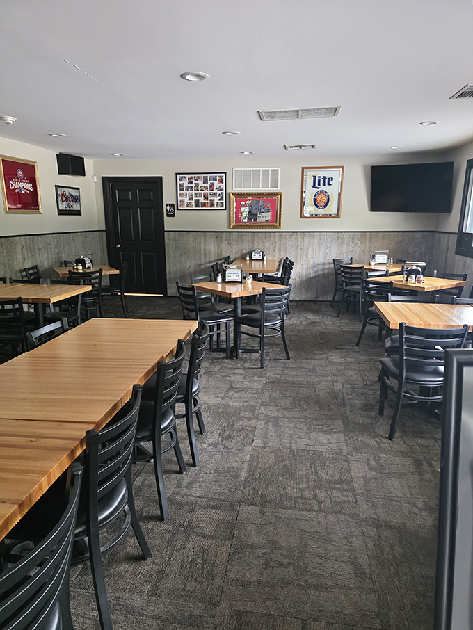 Interior: Simple wooden tables and comfortable chairs create that rare atmosphere where time slows down and conversations flow as freely as the wine.