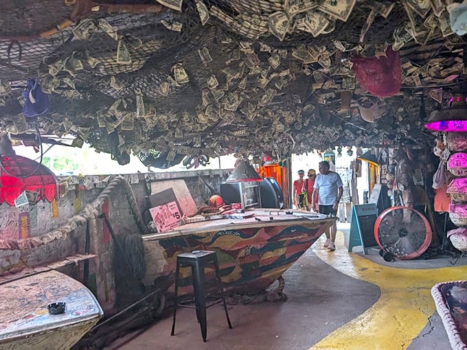 Dollar bills, license plates, and memories cover every inch of ceiling space &ndash; each one representing someone's story in this living museum of quirky Americana.