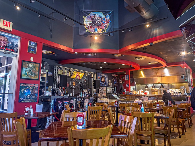 Red walls adorned with rock memorabilia create the perfect backdrop for serious barbecue consumption and impromptu air guitar solos.