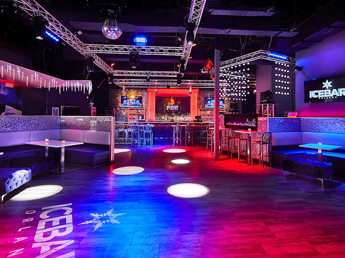 Vibrant LED lighting transforms the nightclub area into a pulsing wonderland of color, where warm bodies thaw out after their icy adventures.