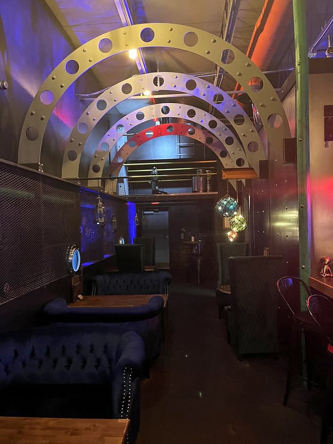 Step inside and you're transported to a steampunk submarine dream &ndash; metal arches overhead, colorful glass buoys, and plush seating create an otherworldly escape.