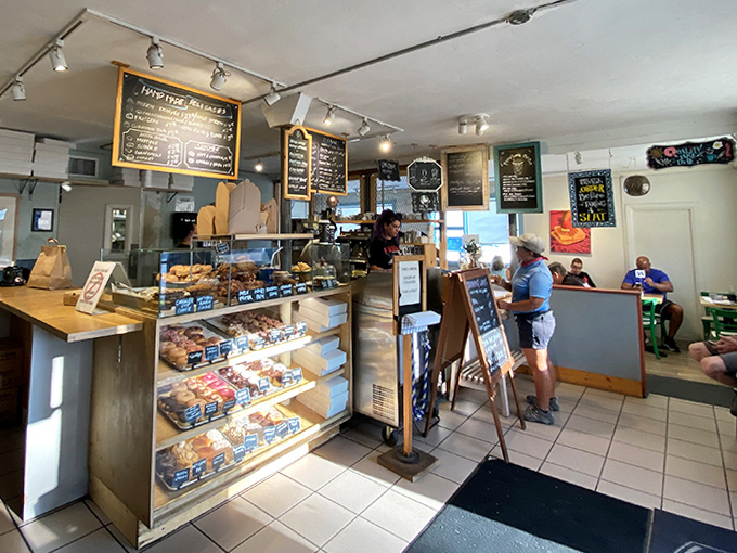 Where breakfast dreams come true &ndash; display cases tempt with pastries while the open kitchen buzzes with morning energy.