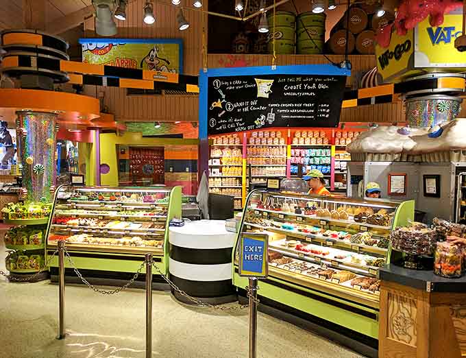 Inside this candy wonderland, display cases gleam with treats while walls burst with colorful confections &ndash; sensory overload in the best possible way.