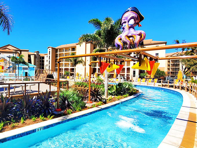 The lazy river winds like a liquid highway of relaxation, where the only traffic jam is the occasional collision of inner tubes and laughter.