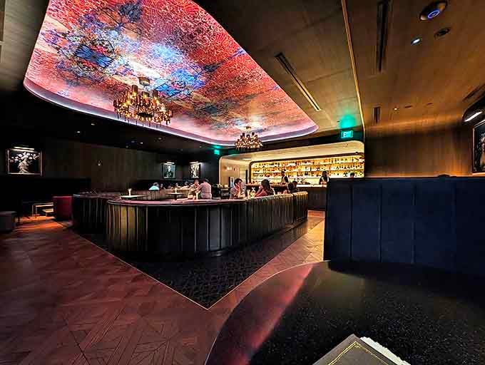 Step inside Hyde's inner sanctum where that spectacular ceiling creates the feeling you've tumbled into a magical painting after hours.