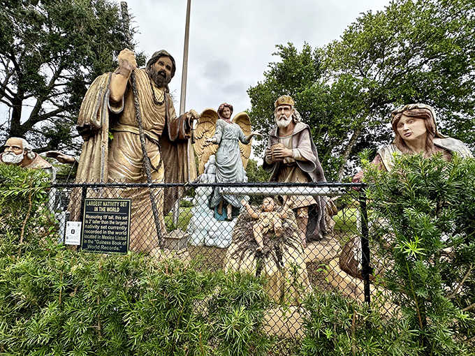 Larger than life biblical figures tower over visitors at the World's Largest Nativity Scene, creating an impressive sacred tableau.