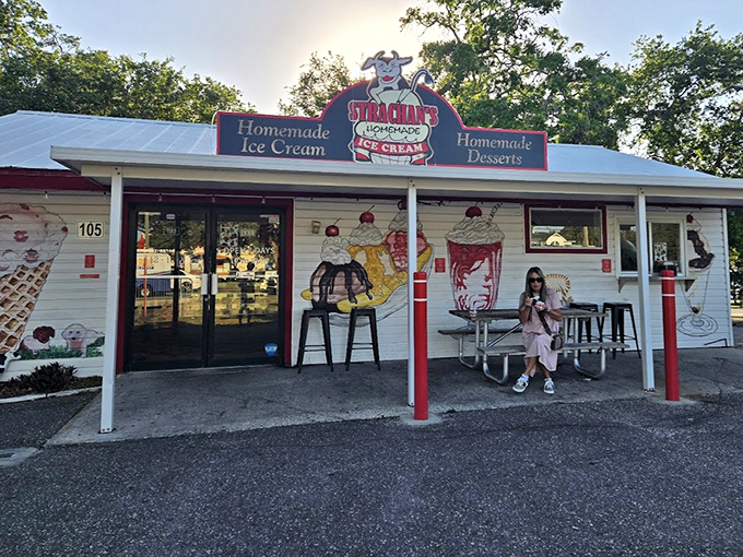 Strachan's quaint white building with cheerful ice cream murals looks like a postcard from simpler times.