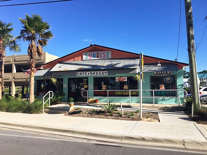Sunrise Cafe's mint-green building stands out like a cheerful beacon among Panama City Beach's sandy landscape.