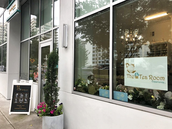 The Tea Room Experience's sleek storefront brings modern elegance to Orlando's tea scene with clean lines and fresh flowers.