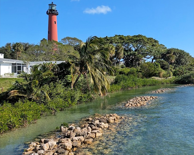 From above, Jupiter Lighthouse commands attention with its vibrant color and strategic position overlooking the waterways that have shaped Florida's history.