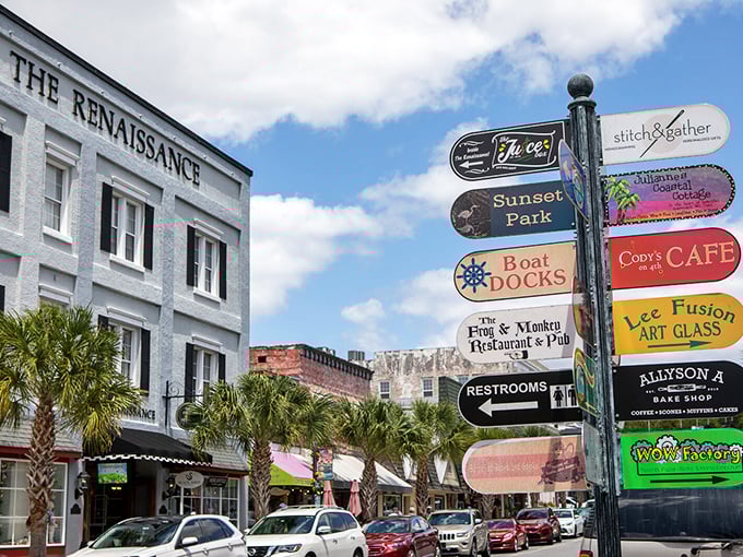 Colorful awnings and brick sidewalks welcome shoppers to Mount Dora's main street, where antique stores and local eateries create a nostalgic atmosphere.