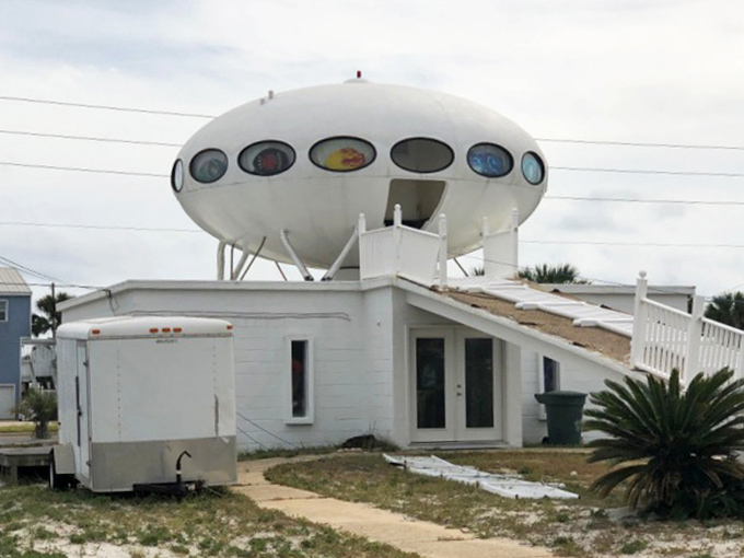 This retro-futuristic spaceship home stands out among traditional beach houses, its white dome gleaming in the Florida sunshine.
