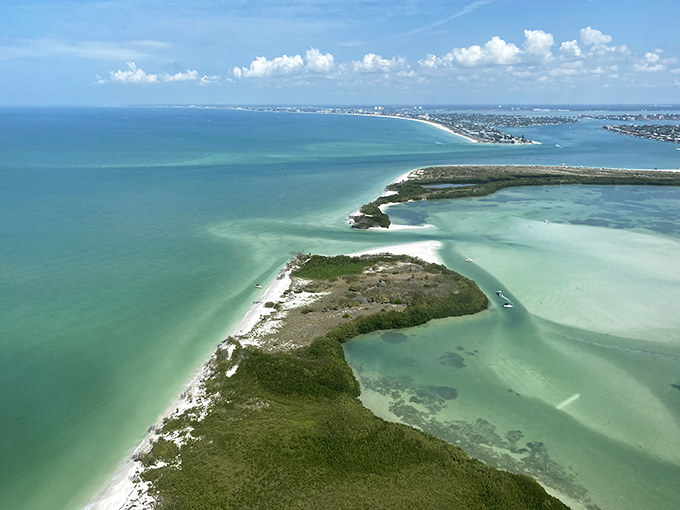 From above, Shell Key curves like a protective arm around its aquamarine waters &ndash; Mother Nature's own infinity pool.