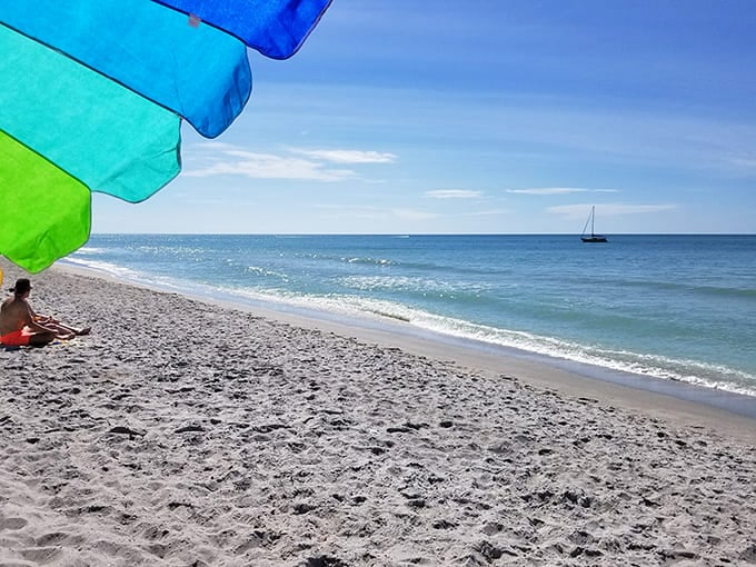 That moment when you realize the beach umbrella rainbow is almost as beautiful as the actual view.