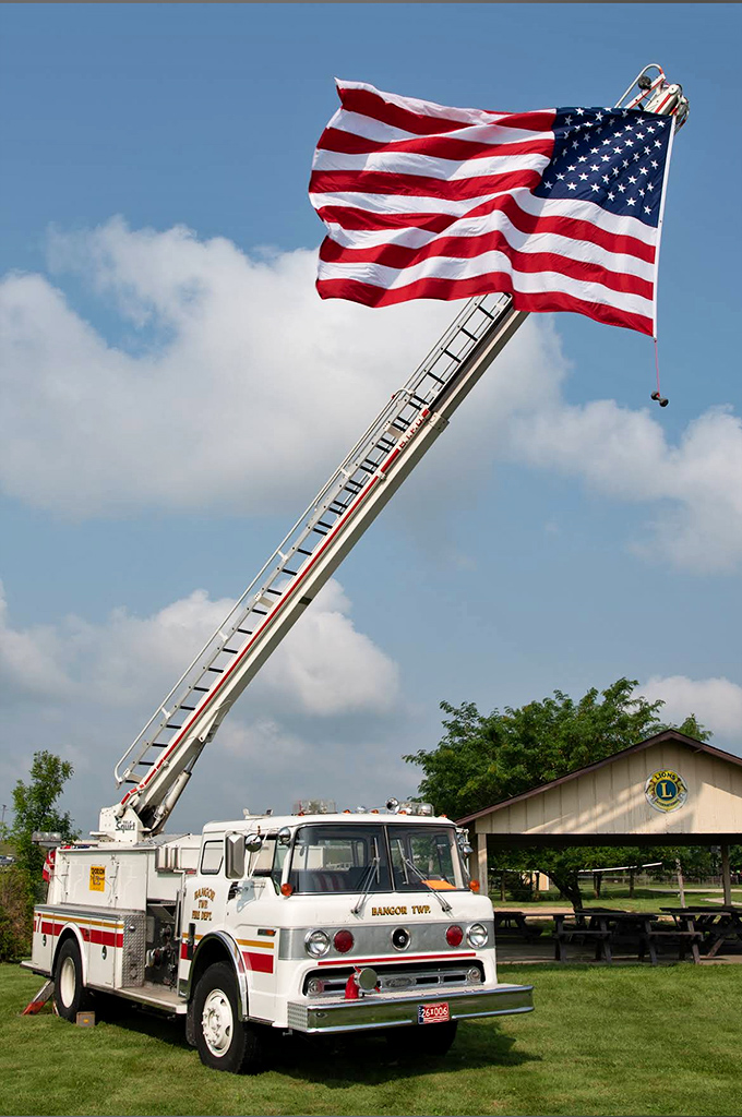 The Bangor Township truck stands tall and proud, its American flag a reminder of the patriotic service firefighters provide to communities nationwide.