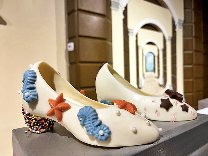 These aren't Cinderella's glass slippers – they're better! Chocolate high heels adorned with edible seashells make fashion deliciously impractical.