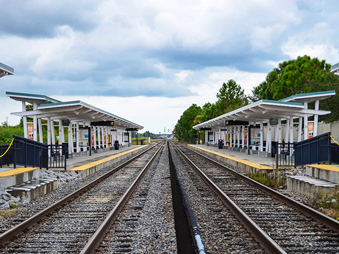 Parallel tracks stretch toward the horizon, offering a symmetrical perspective that photographers love to capture during golden hour rides.