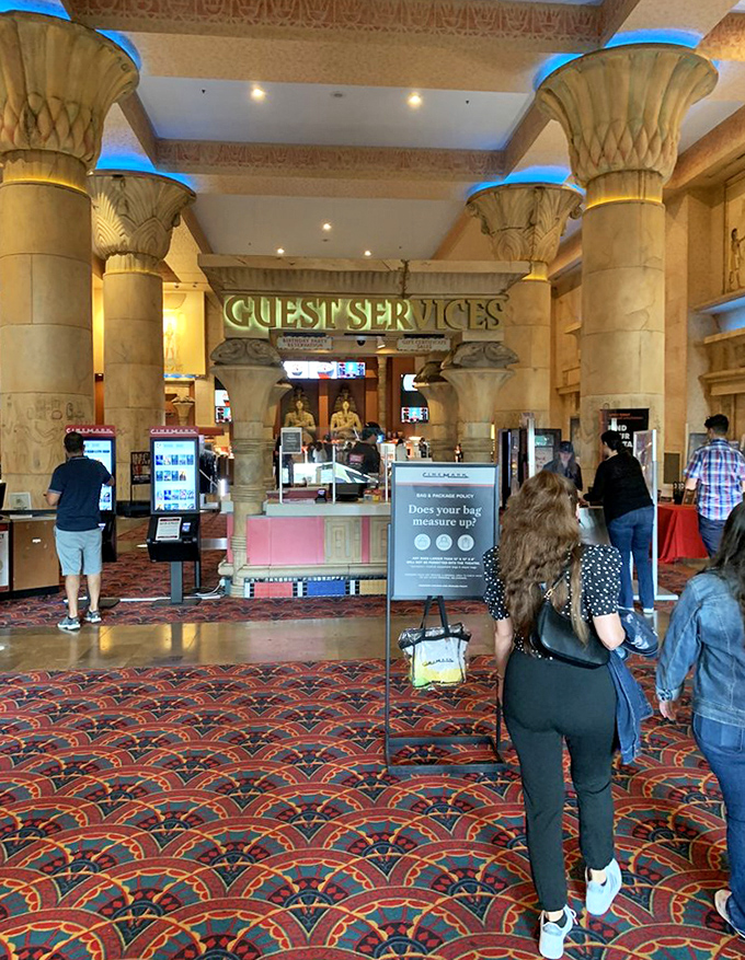 The guest services area, where helpful staff assist you while being watched over by silent stone guardians from another era.