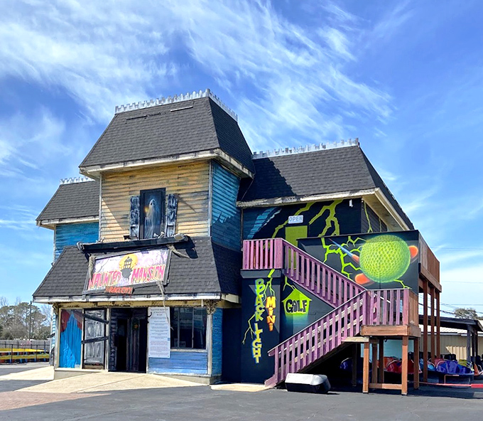 Not your average haunted house &ndash; this technicolor nightmare factory promises scares with a side of whimsy and architectural confusion.