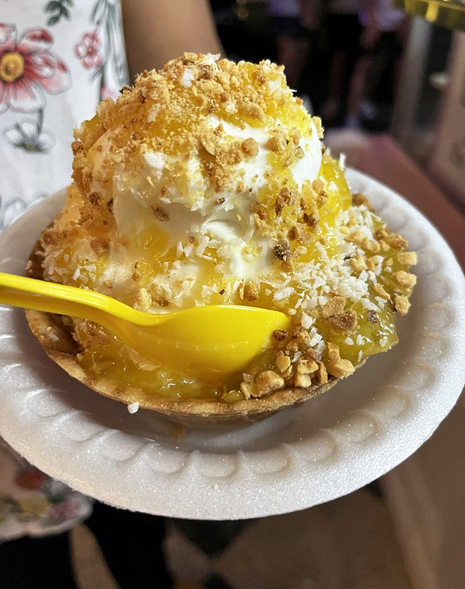 The Hawaiian Delight tart combines golden pineapple, vanilla ice cream, and crunchy toppings in a harmony so perfect you'll swear you hear ukuleles with every bite.