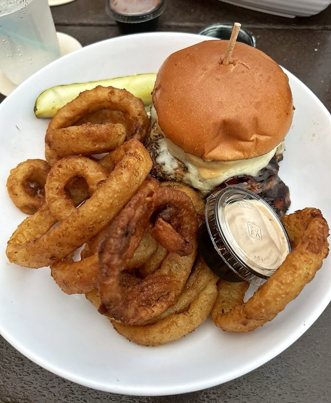 The legendary jerk chicken sandwich arrives with golden onion rings &ndash; a combo that might make you consider moving to Florida permanently.