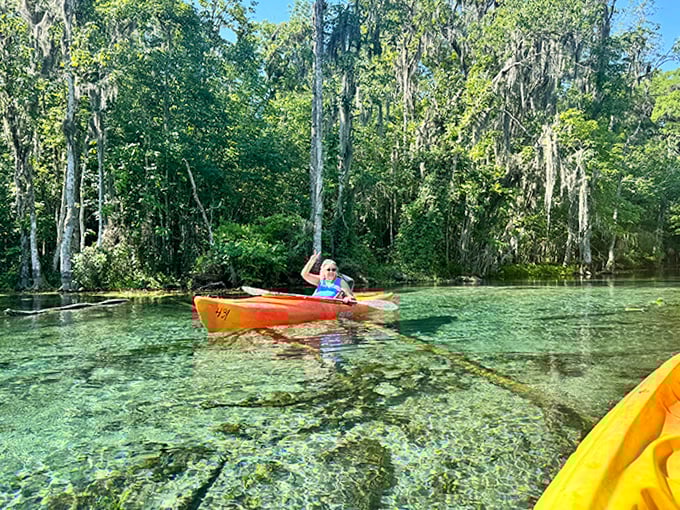 Paddling over water so clear it's like floating on air, with fish below wondering what that strange shadow is doing above their living room.