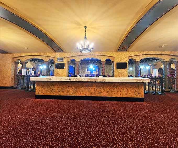 The lobby's Mediterranean revival style creates an atmosphere where you half-expect to see flappers and gentlemen in fedoras mingling between acts.