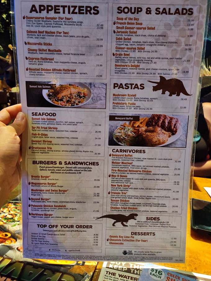 The menu reads like a paleontologist's dream, with cleverly named dishes from Supersaurus Samplers to the mighty Megasaurus Burger.