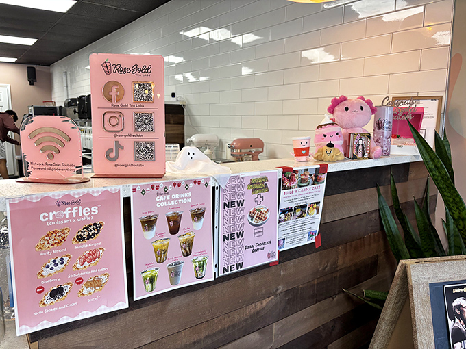 The menu board showcases a tempting array of options, from signature bubble teas to those famous cloud-like pancakes that have customers lining up.
