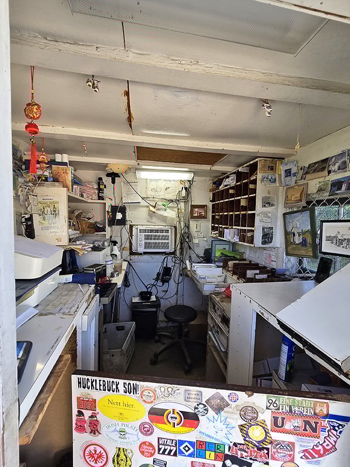Marie Kondo would have a panic attack here – every inch of this 61-square-foot workspace is maximized with postal precision.