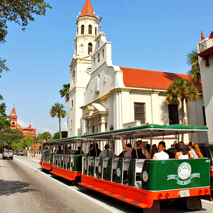 All aboard the time machine! Old Town Trolley Tours whisk visitors past St. Augustine's Cathedral Basilica and other historic landmarks.