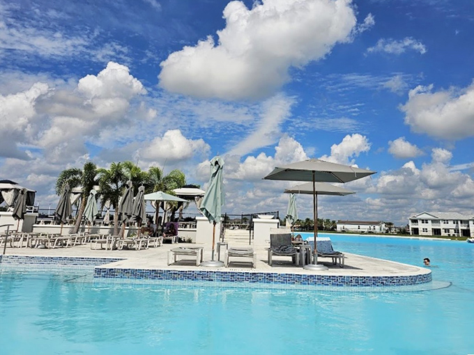 Poolside Lounge Chairs Sun-kissed relaxation stations await tired swimmers under Florida's impossibly photogenic sky.